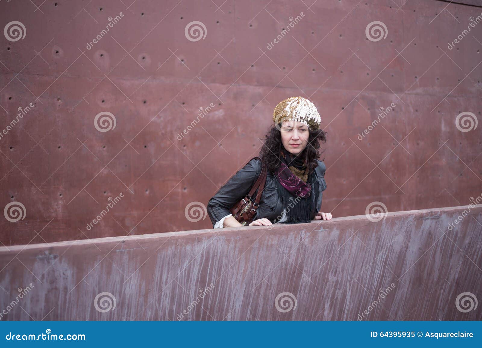 Woman Looking Over Red Concrete Ledge Stock Image - Image of single ...