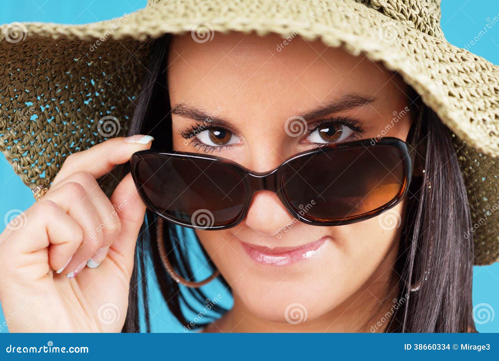 Woman Looking Over Sunglasses Stock Photo - Image of play, beauty: 38660334