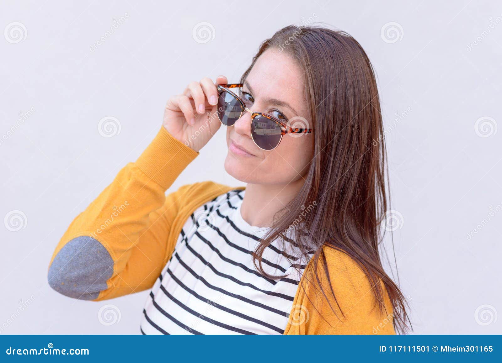 Woman Looking Over Sunglasses Stock Image - Image of model, female ...