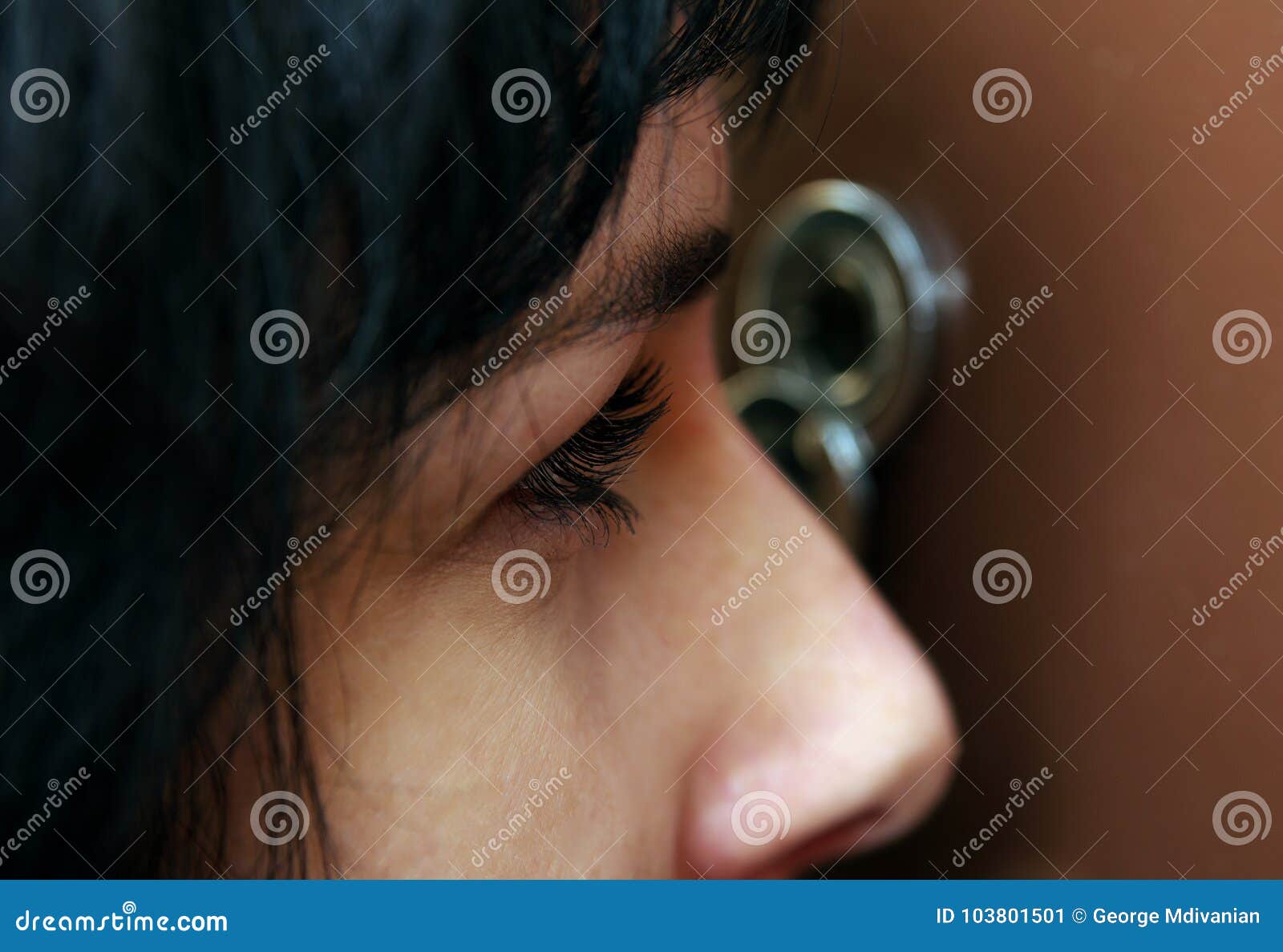 Woman Looking through Peephole Stock Image - Image of metallic, design ...