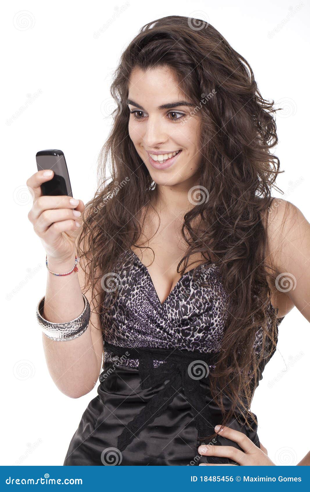 Woman looking at the phone stock photo. Image of girl - 18485456