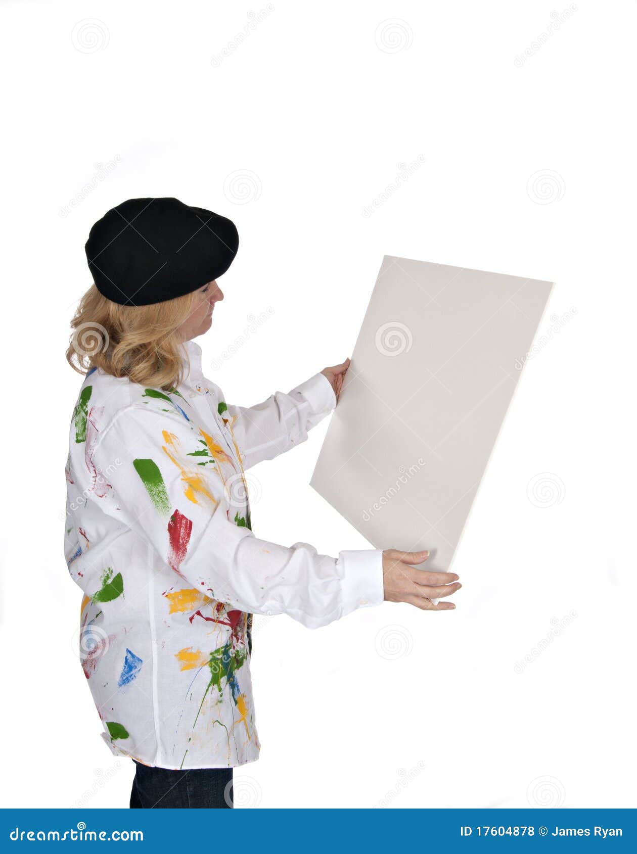 Woman looking at poster stock photo. Image of hand, canvas - 17604878