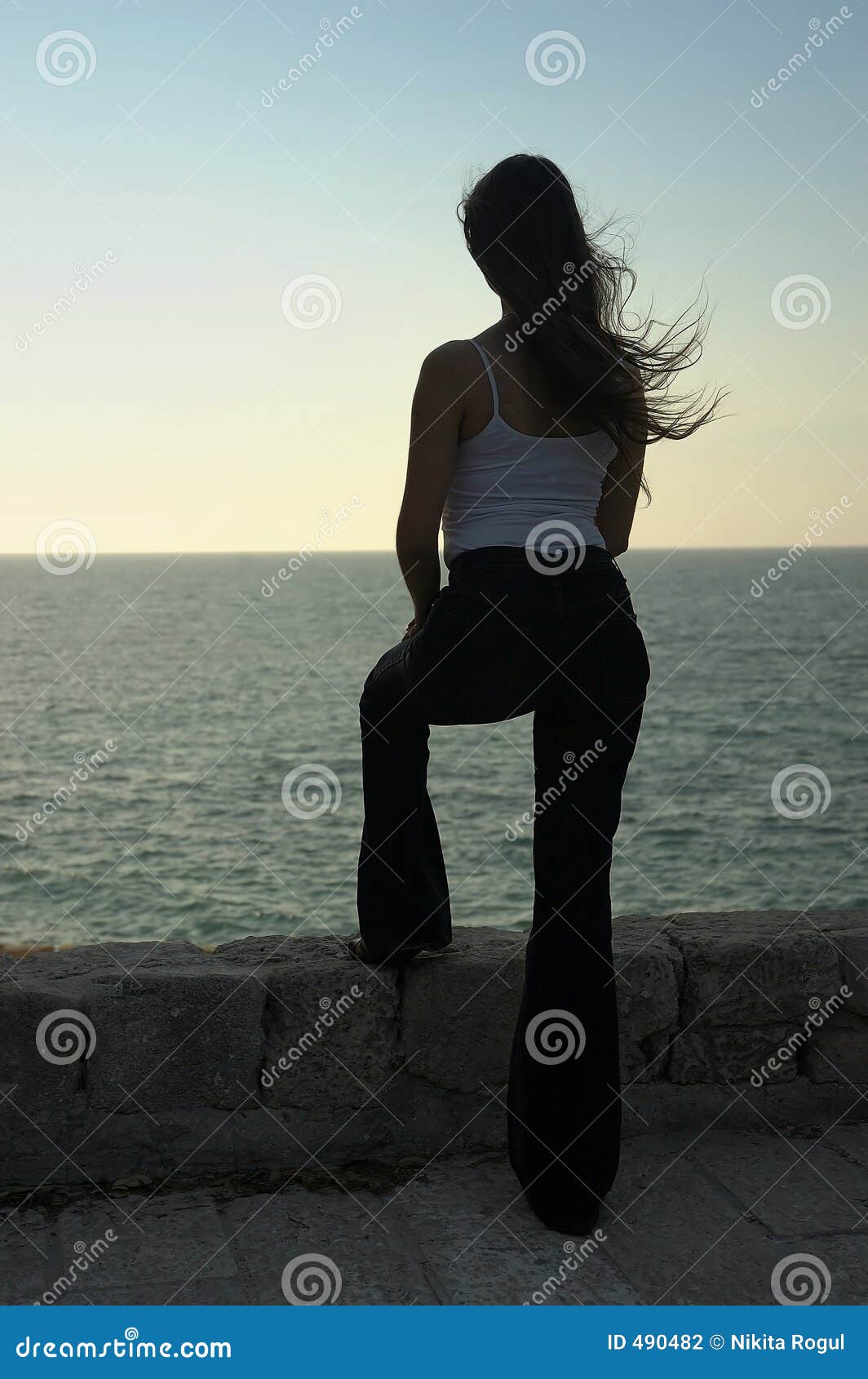 Woman looking at sea stock photo. Image of hair, girl, long - 490482