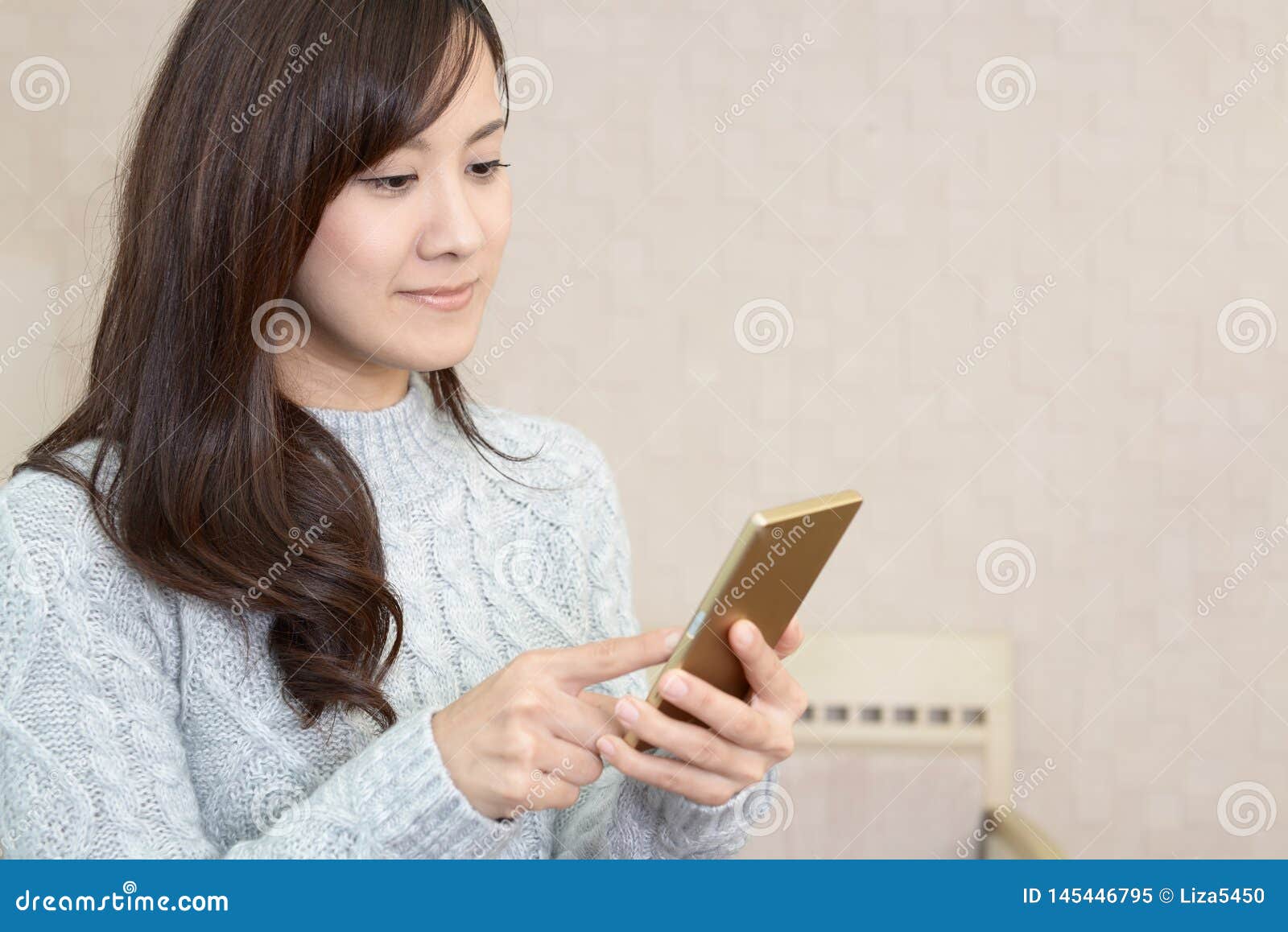 Smiling Woman Using a Smart Phone Stock Image - Image of attractive ...