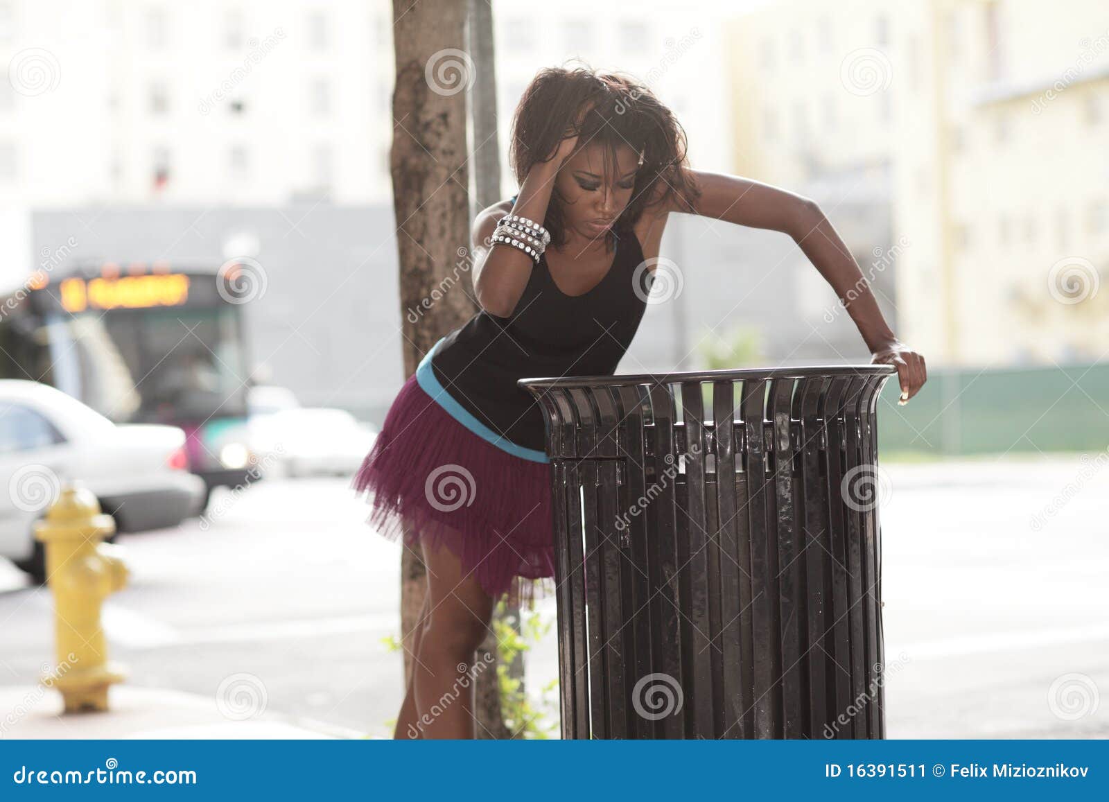 Woman Looking in a Trash Can Stock Image - Image of shirt, stylish ...