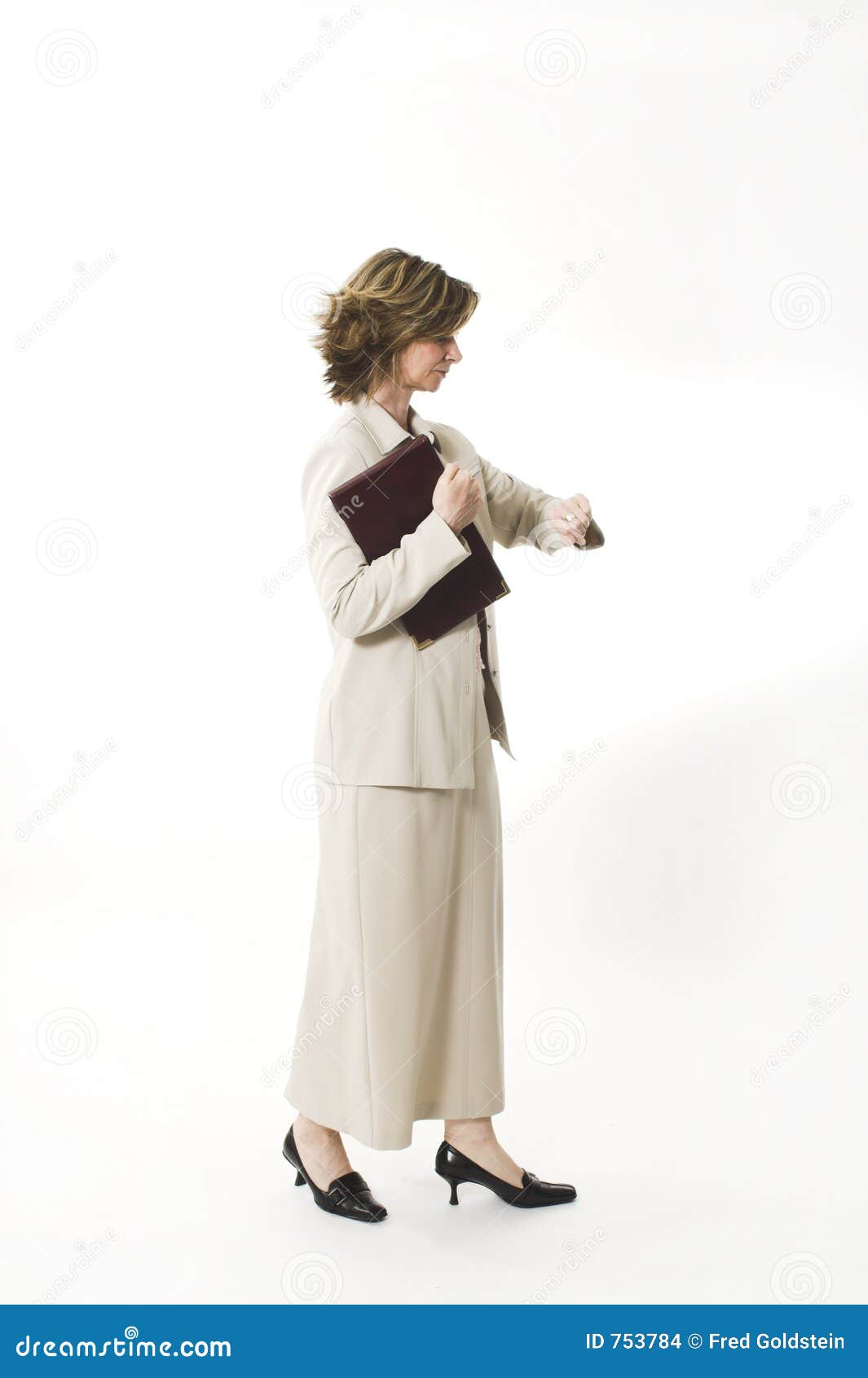 Woman looking at watch stock photo. Image of elegant, businessperson ...