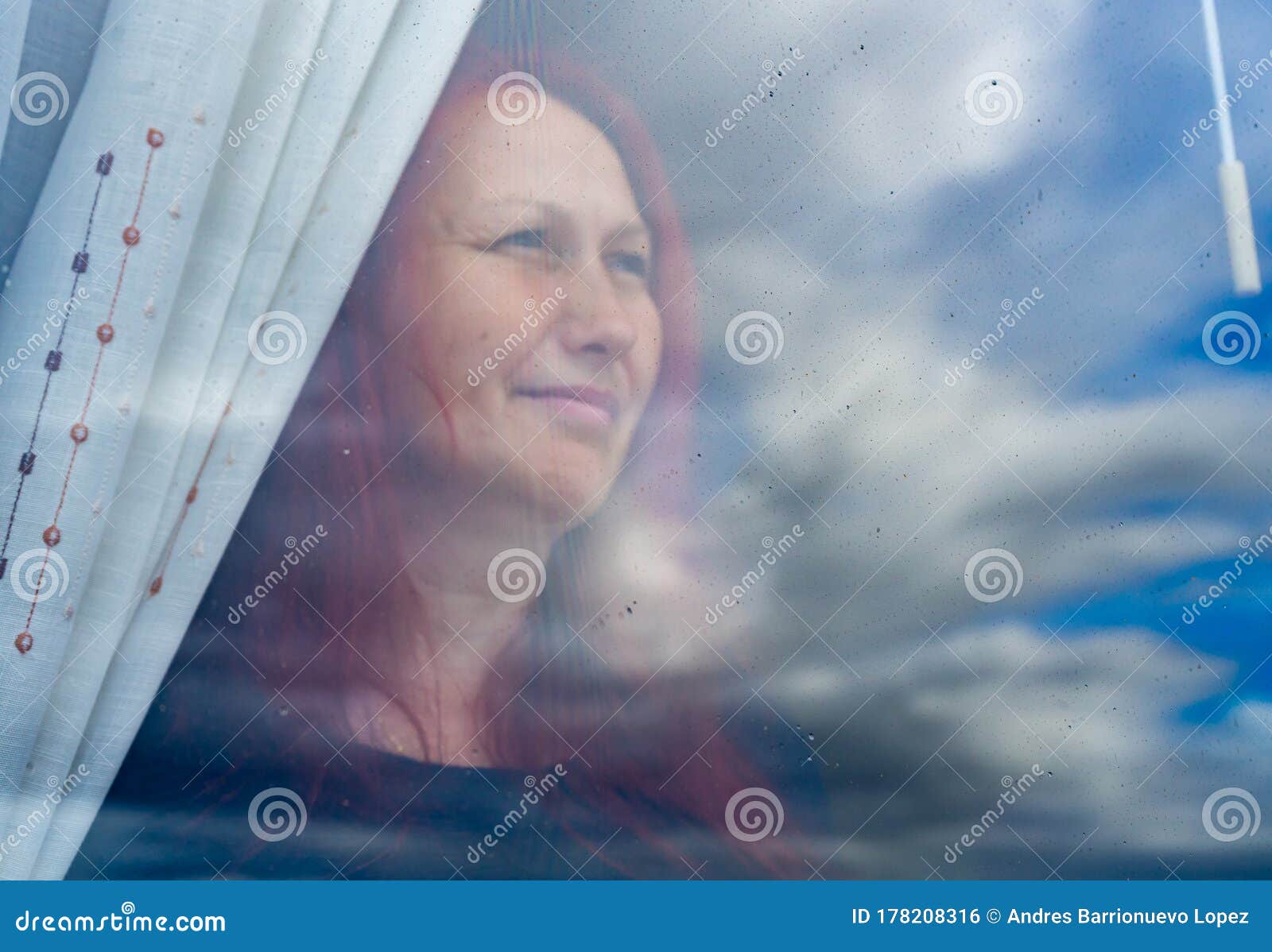 Woman Looking through the Window on a Rain Day Stock Photo - Image of ...