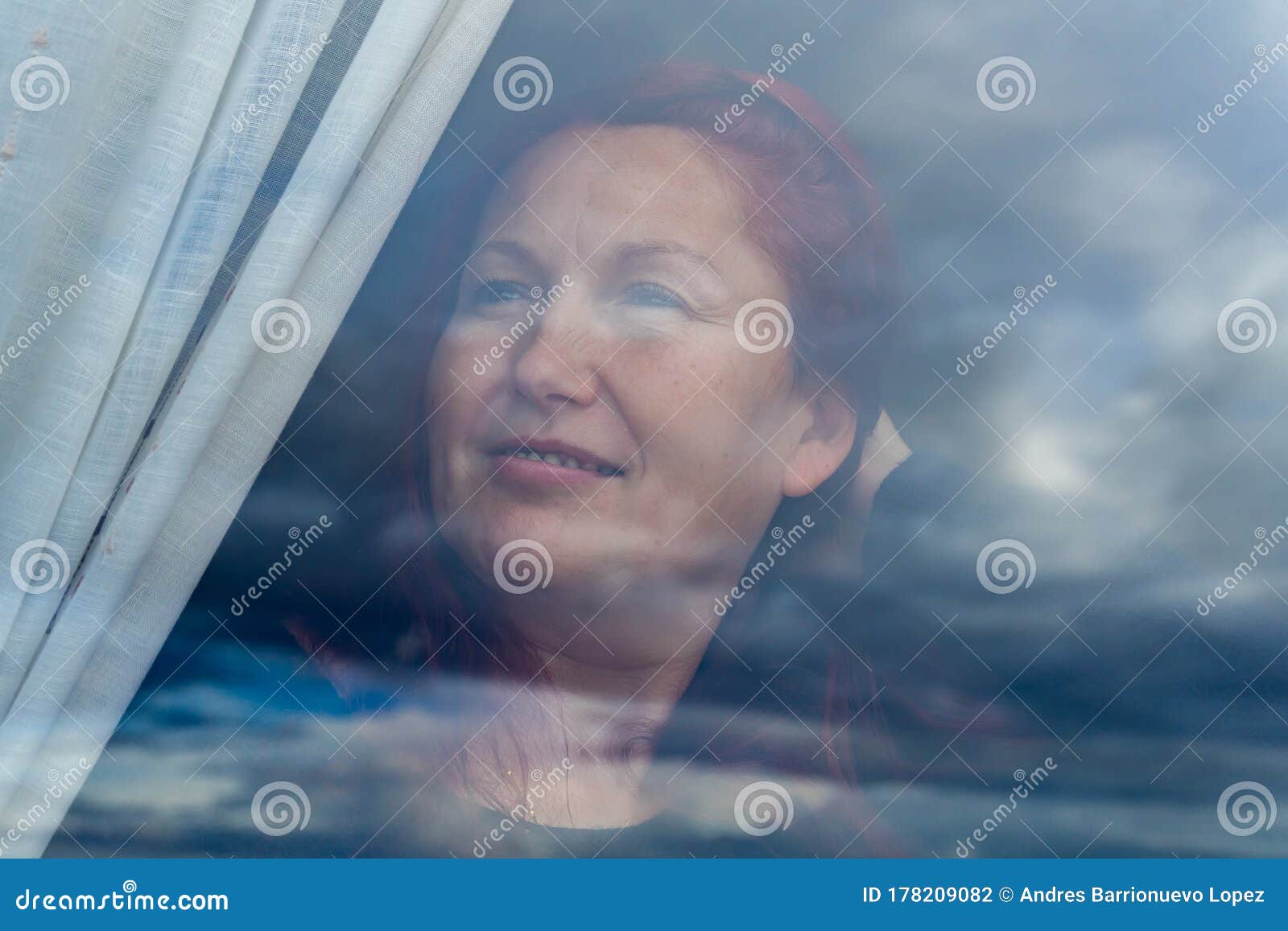 Woman Looking through the Window on a Rain Day Stock Photo - Image of ...
