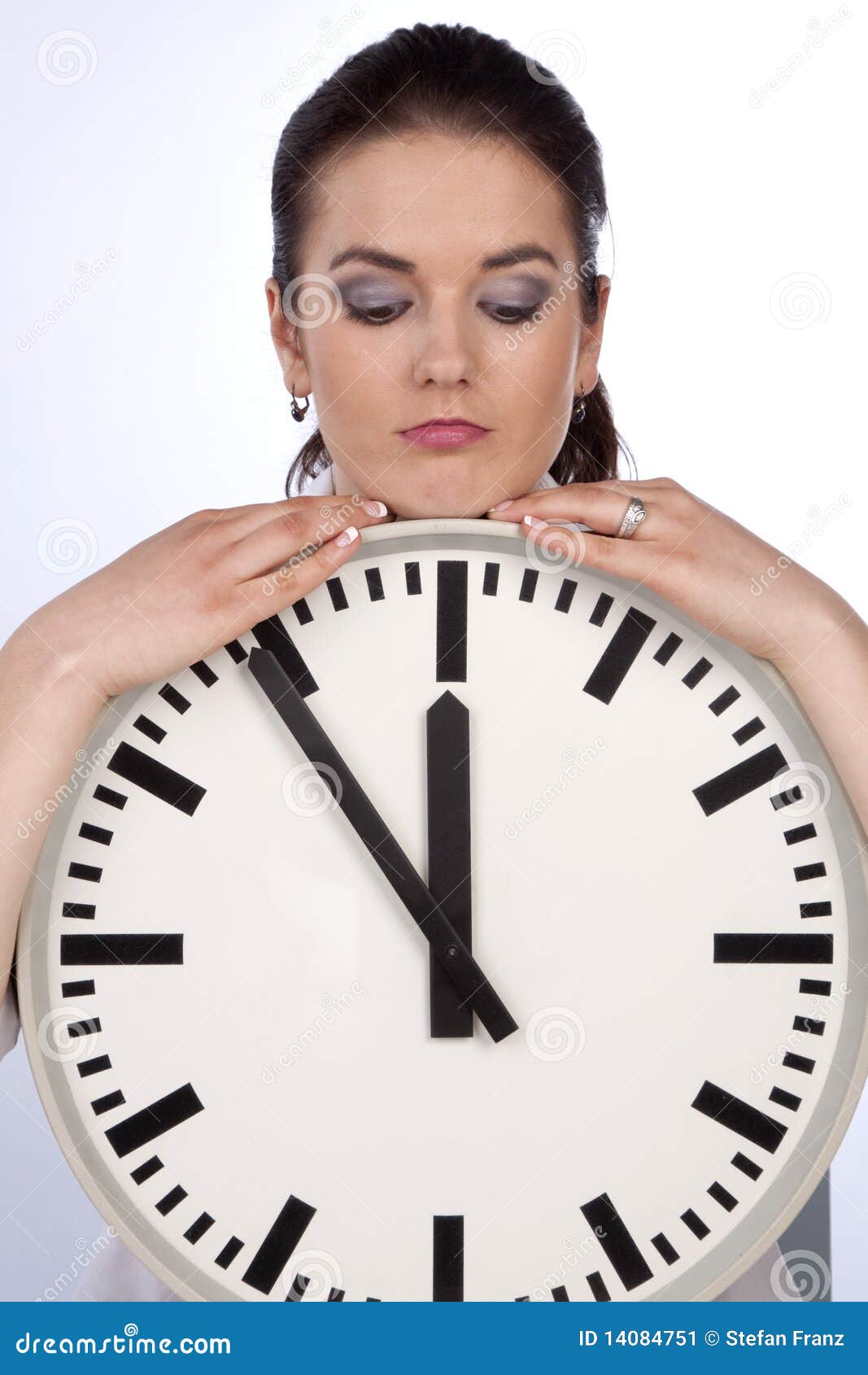 Woman looks on Clock stock image. Image of climate, demographic - 14084751
