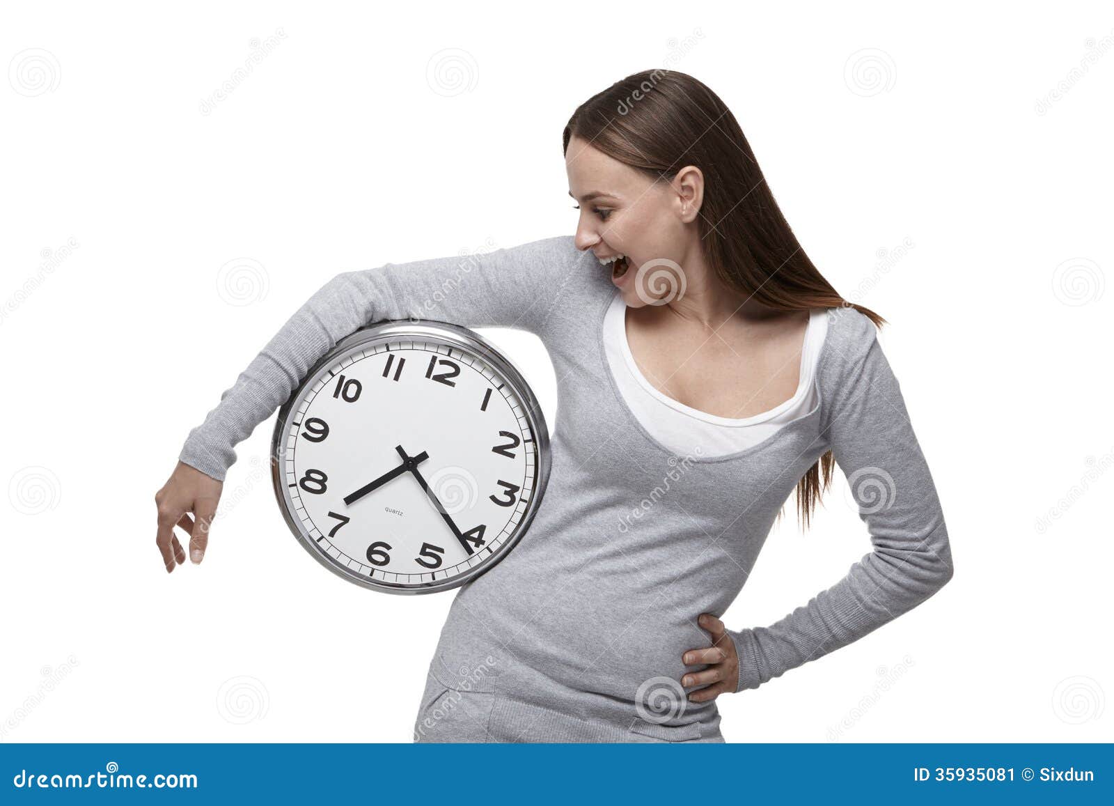 Woman looks at the clock stock image. Image of cheerful - 35935081