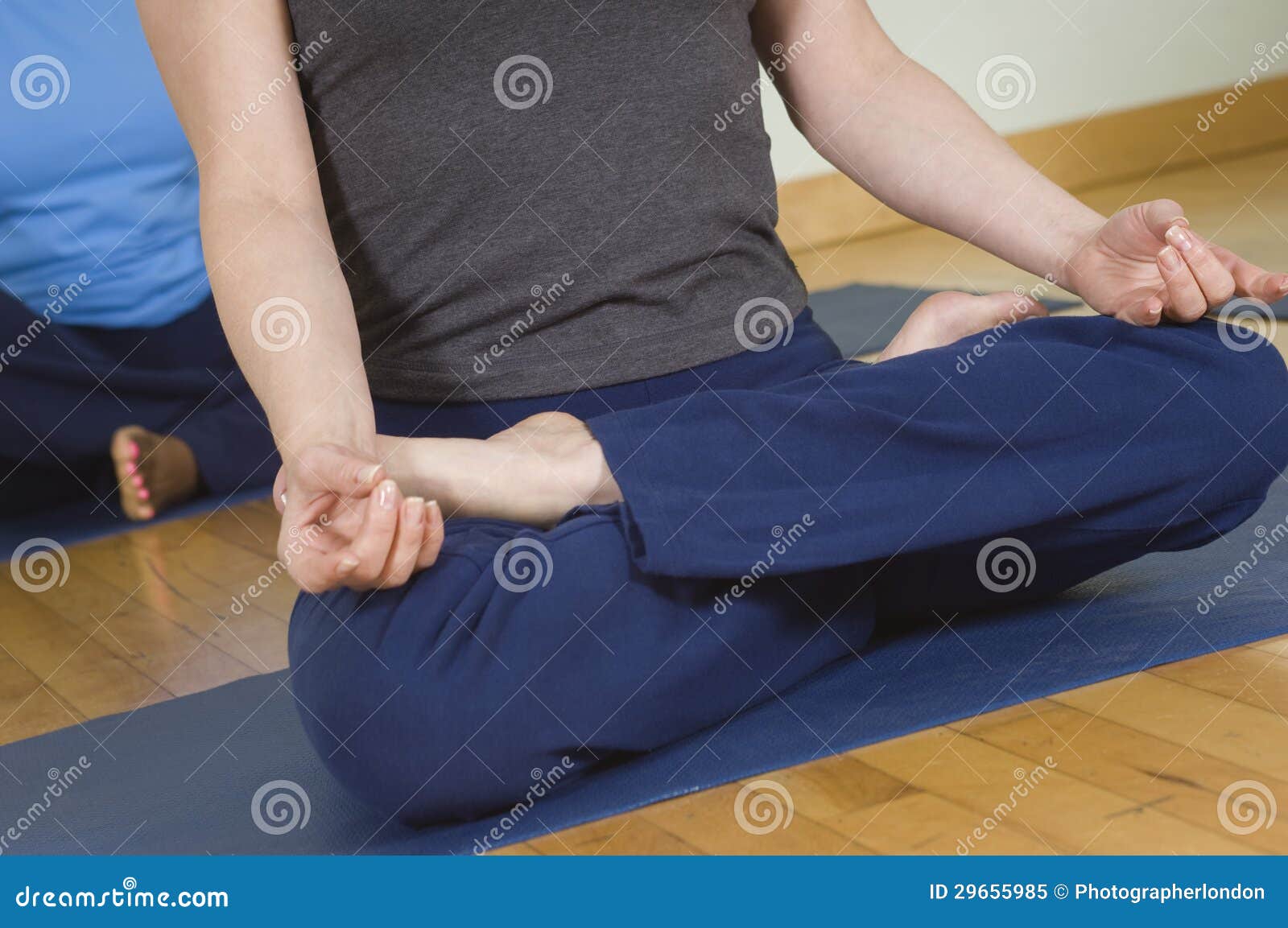 Woman in Lotus Position stock image. Image of mature - 29655985