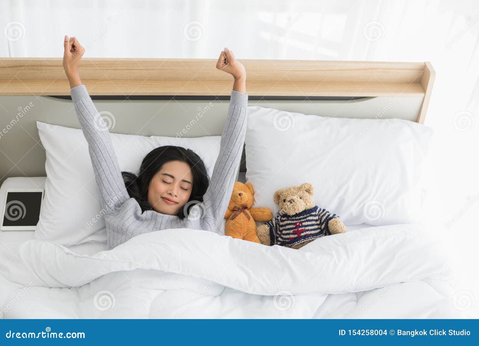Woman Lying in Bed and Looking Over the Blanket Stock Photo - Image of ...