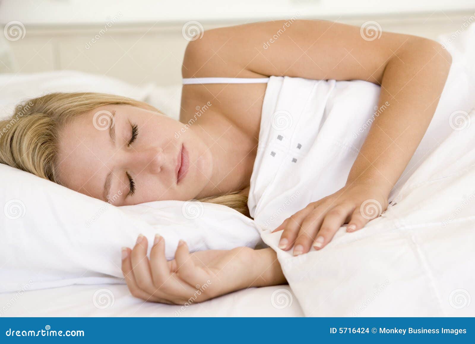 Woman Lying In Bed Sleeping Stock Photography | CartoonDealer.com #5716424