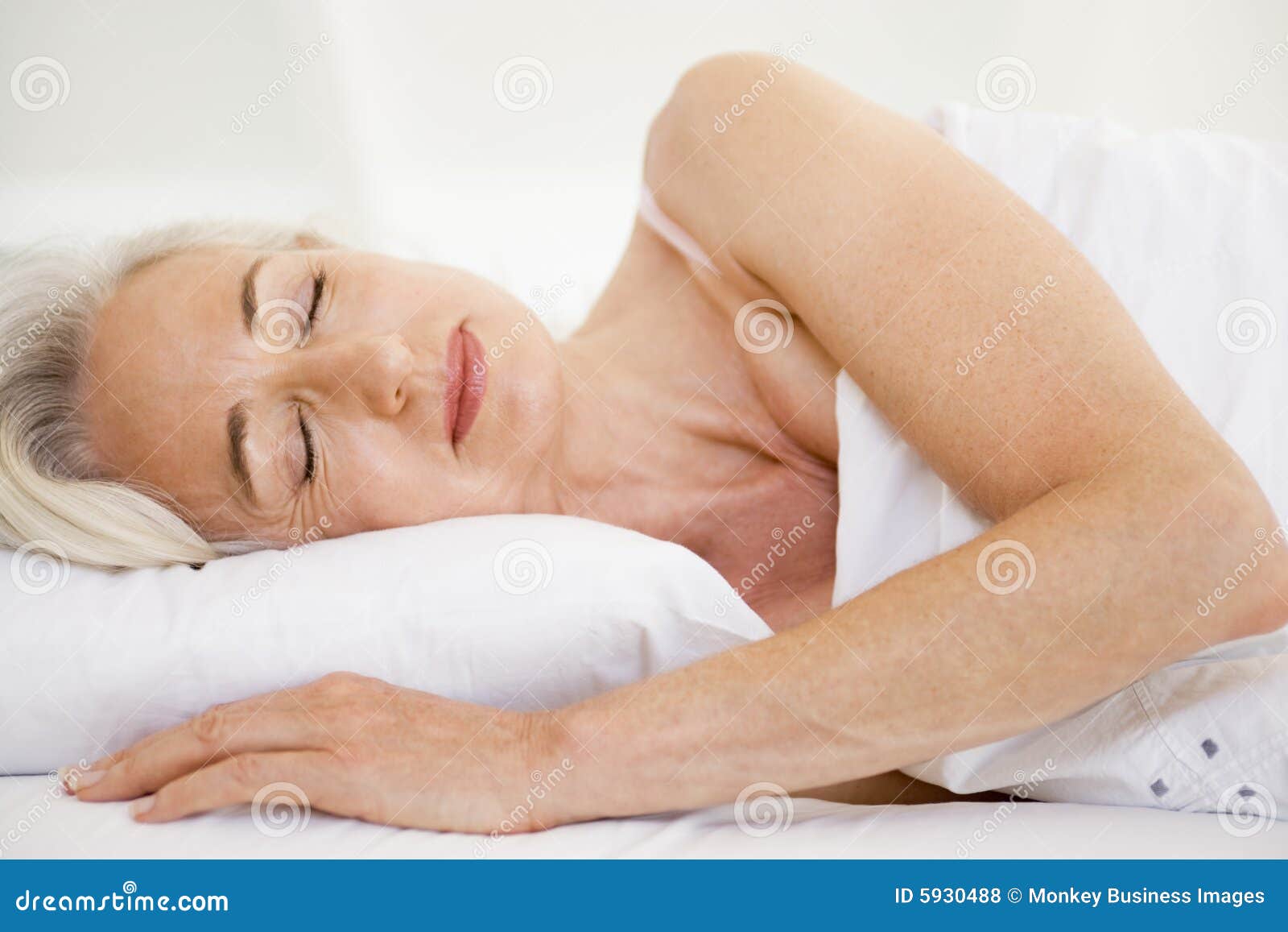 Woman Lying in Bed Sleeping Stock Photo - Image of nightclothes, tired ...