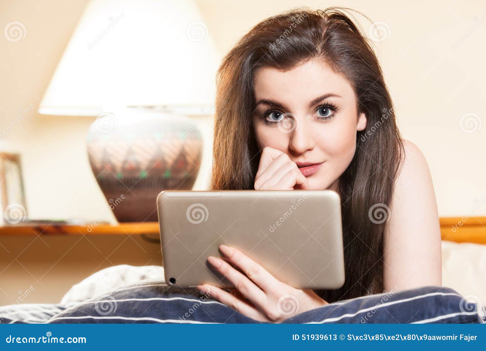 Woman Lying on the Bed and Using Tablet Stock Image - Image of relaxed ...