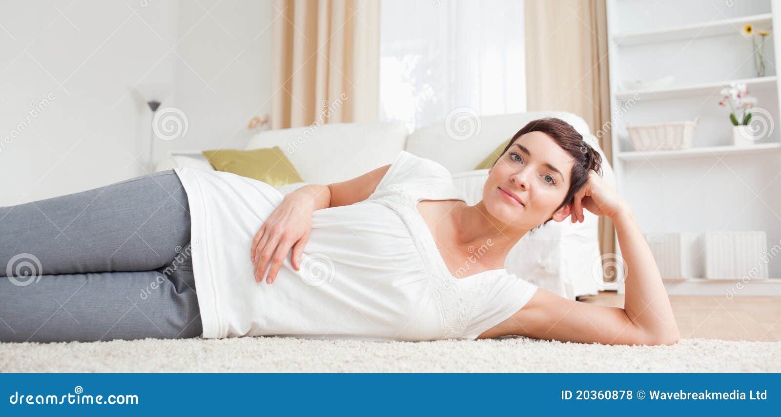 Woman lying on a carpet stock photo. Image of lady, hair - 20360878