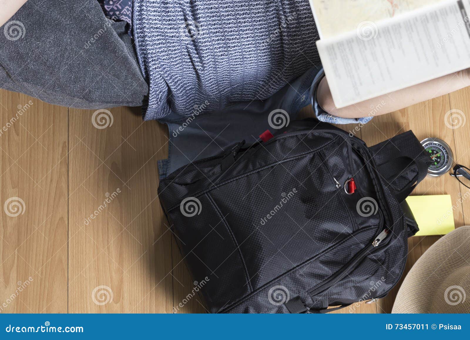 Woman Lying on Floor with Map, Backpack and Compass Stock Image - Image ...