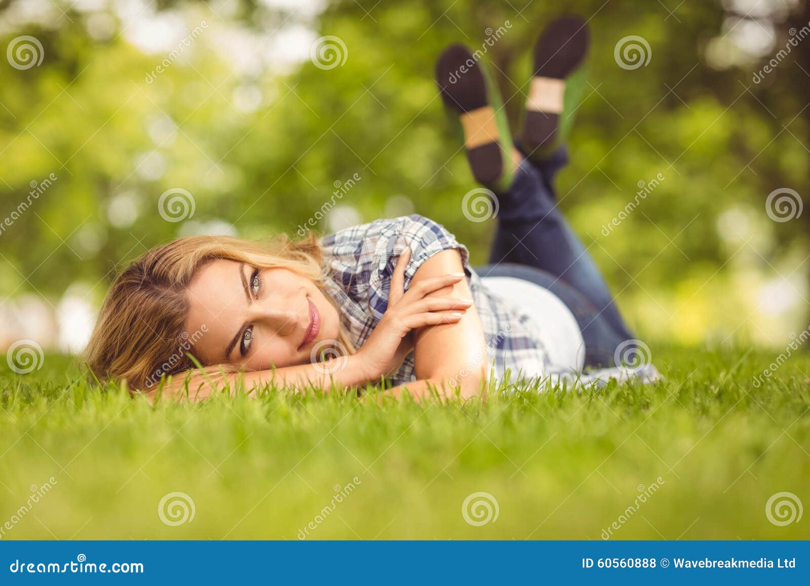 Woman Lying on Front at Park Stock Photo - Image of lying, long: 60560888