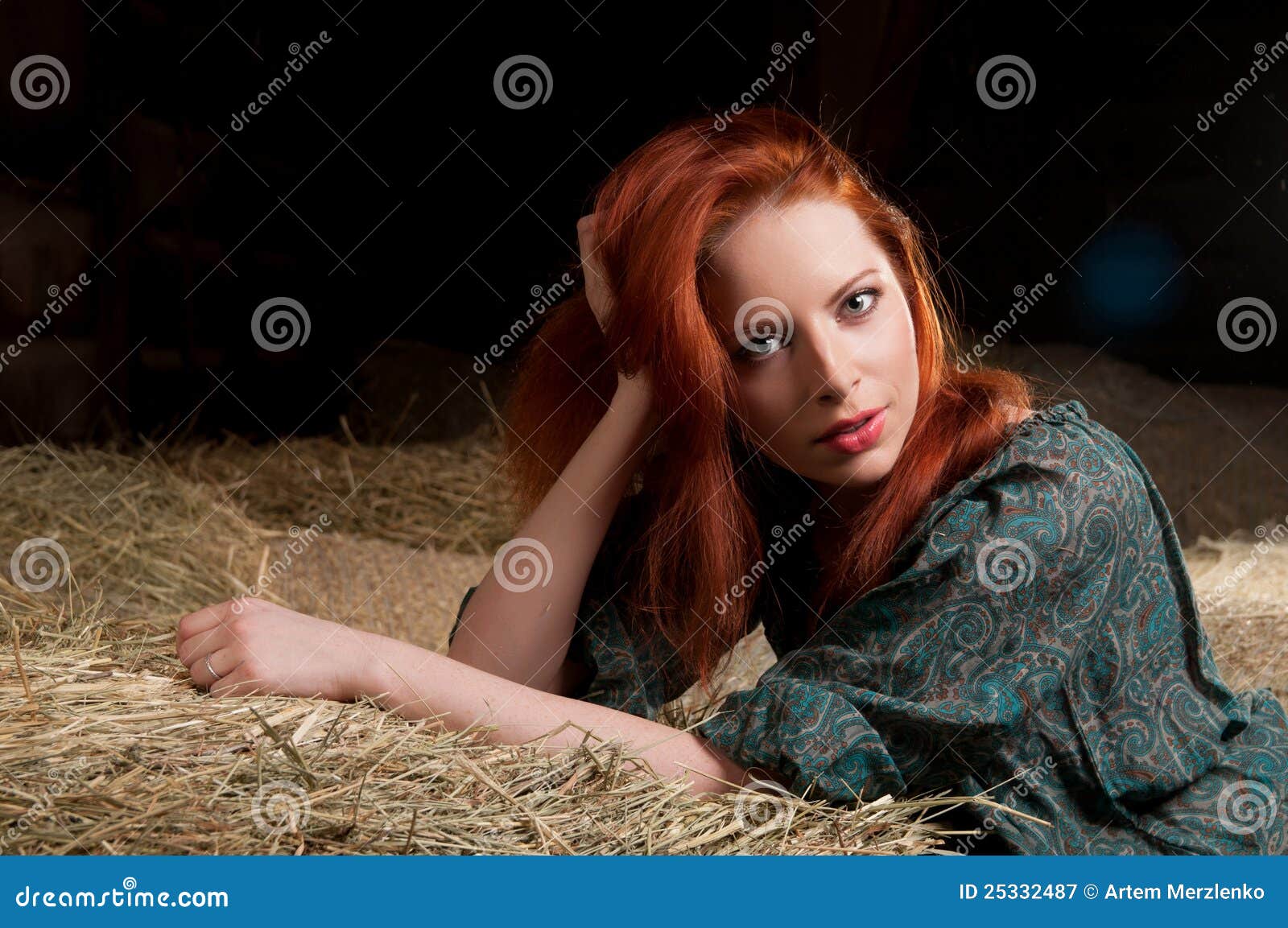 Woman lying on a haystack stock image. Image of face - 25332487