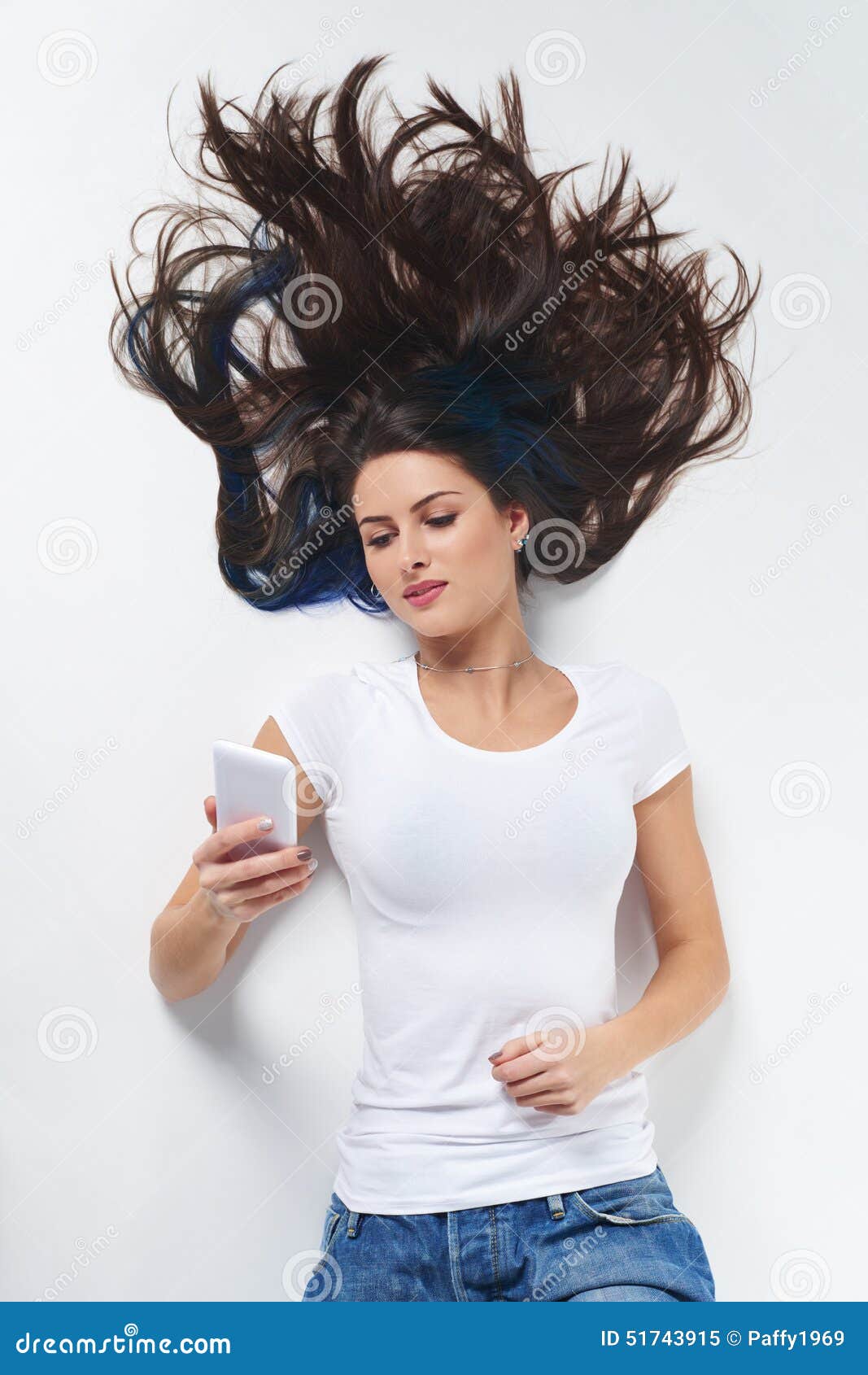 Woman Lying on Her Back and Using Phone Stock Image - Image of ...