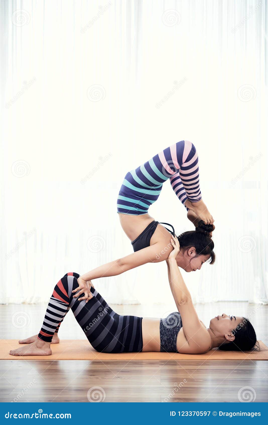 Acroyoga practice stock image. Image of balancing, trust - 123370597