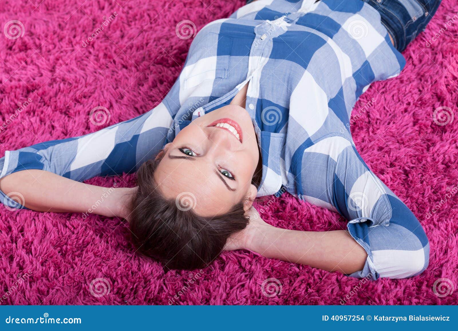 Woman Lying on a Pink Carpet Stock Photo - Image of repose, glad: 40957254