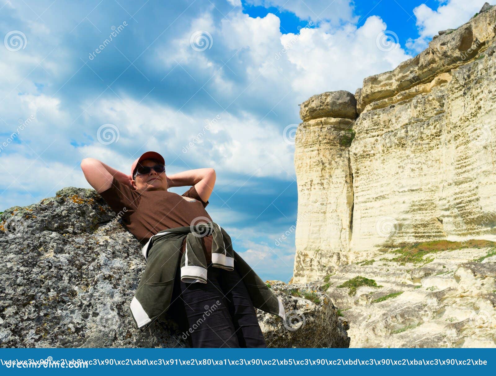 Woman Lying on the Stone Near High Cliffs Stock Image - Image of caves ...