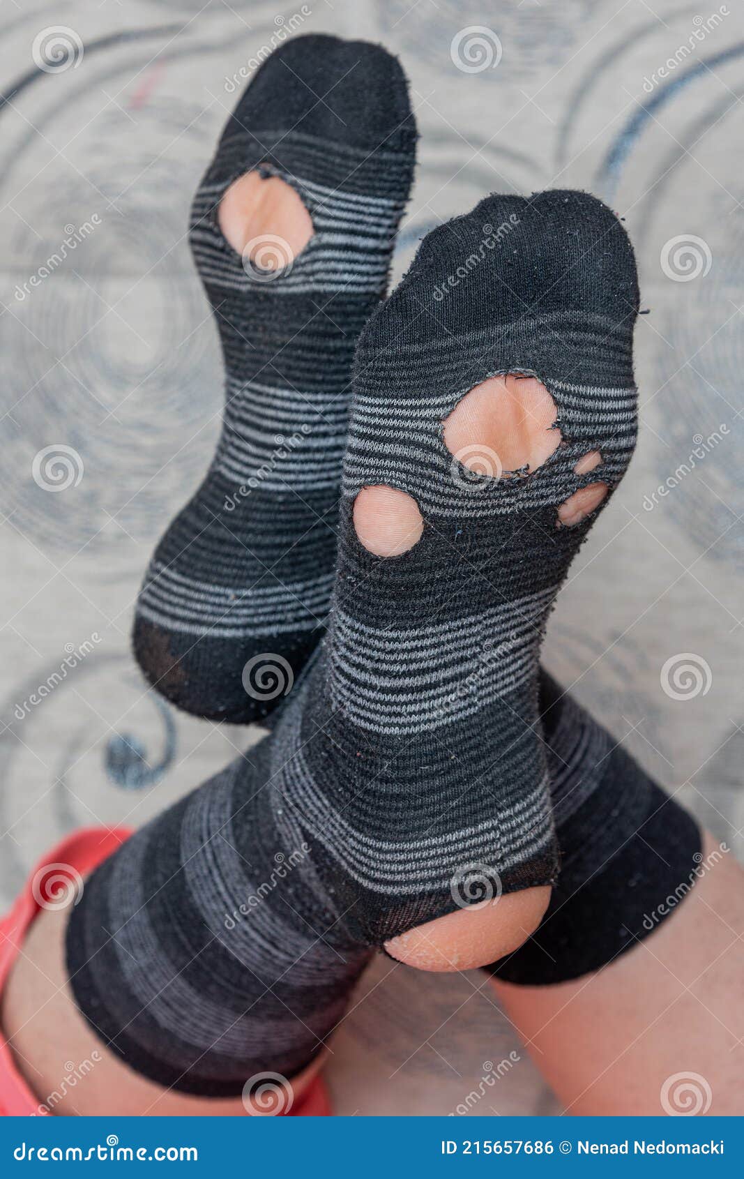 The Woman is Lying with Torn Socks. Worn Socks Stock Photo - Image of ...