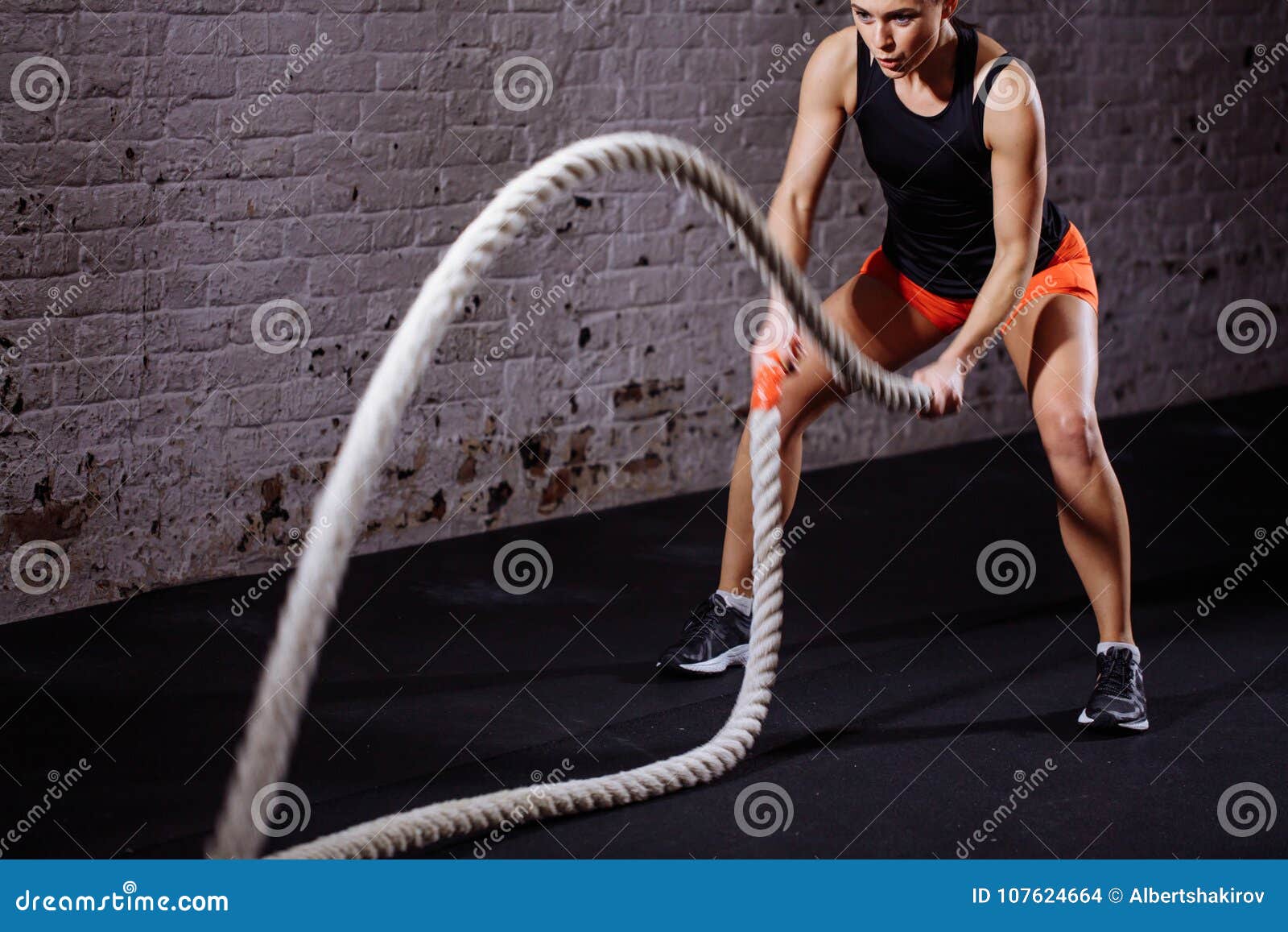 Woman Make Exercise with Battle Rope in Functional Training Gym Stock ...