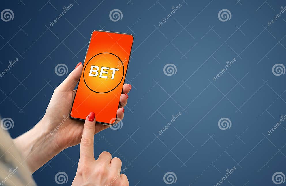 A Woman Makes Bets on a Tablet Stock Image - Image of home, chance ...