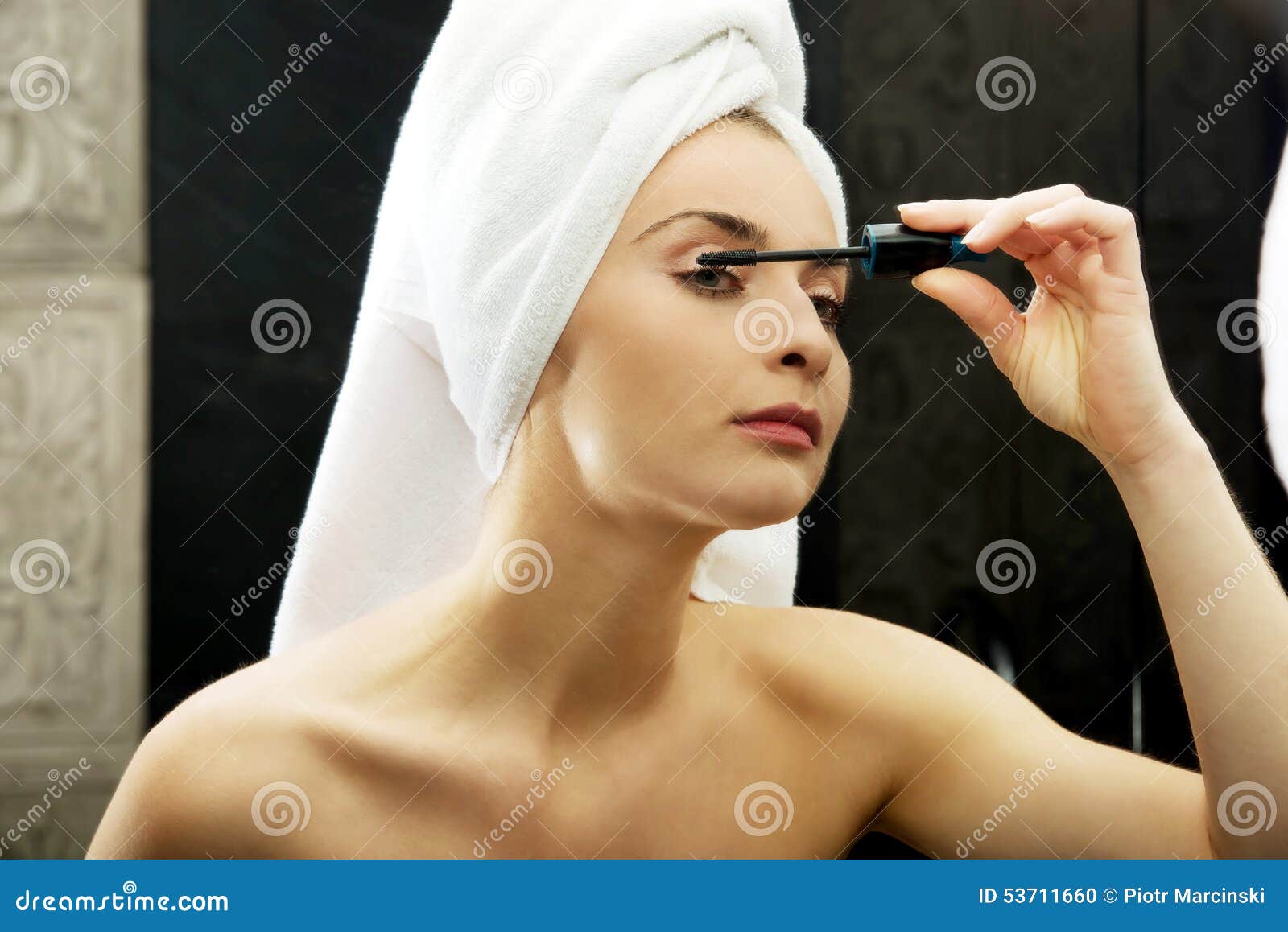 Woman Makes Light Day Makeup in Bathroom. Stock Photo - Image of female ...