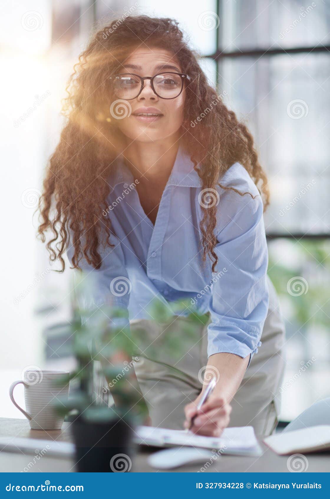 Woman Makes a Report in the Office. Woman Writing Notes for Educational ...
