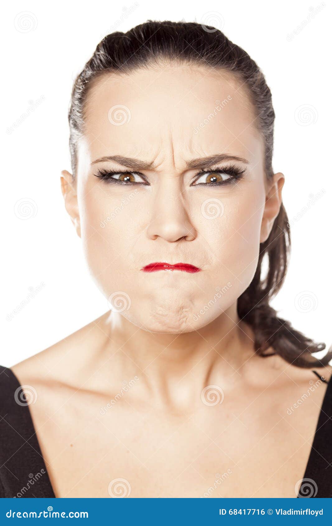 Woman making angry face stock photo. Image of kneel, equipment - 68417716