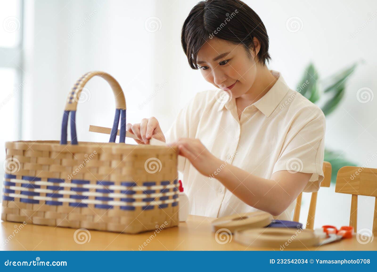 A Woman Making a Basket with a Craft Band Stock Photo - Image of asia ...