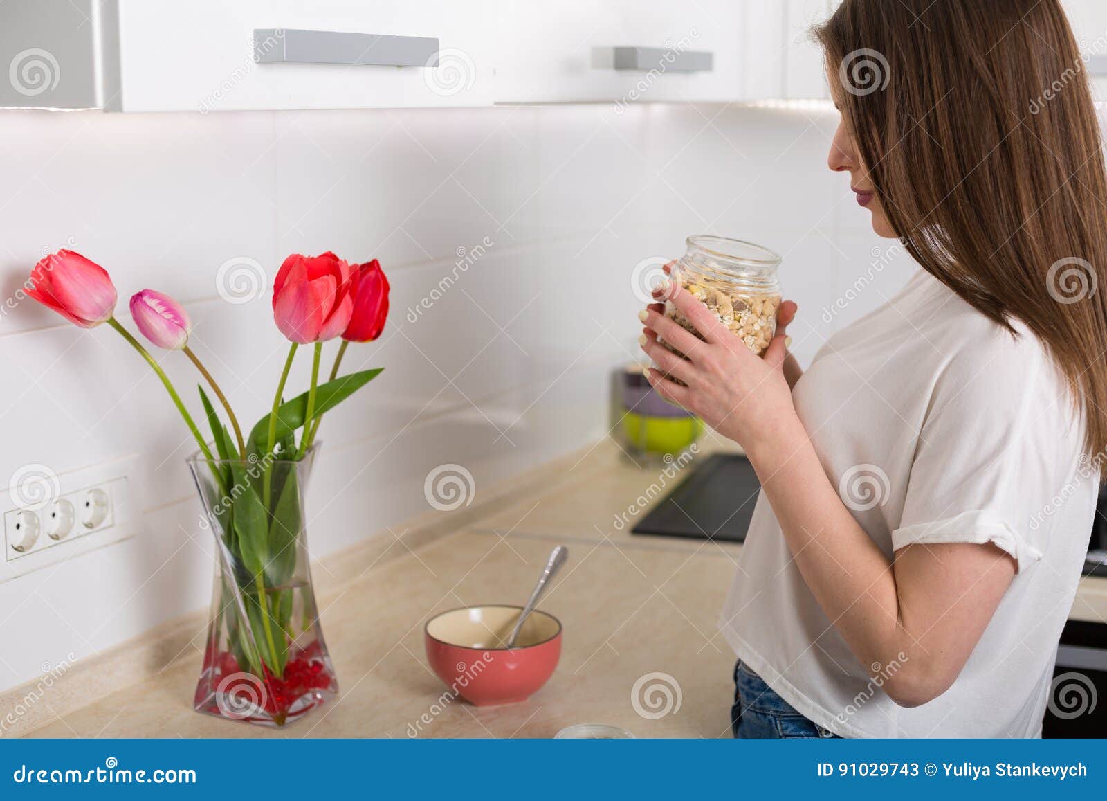 Woman making breakfast stock image. Image of cereal, flowers - 91029743