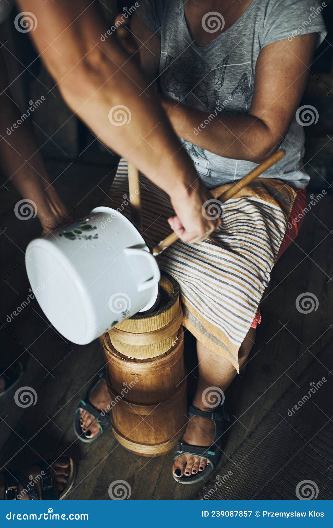 Woman Making Butter with Butter Churn. Old Traditional Method Making of ...