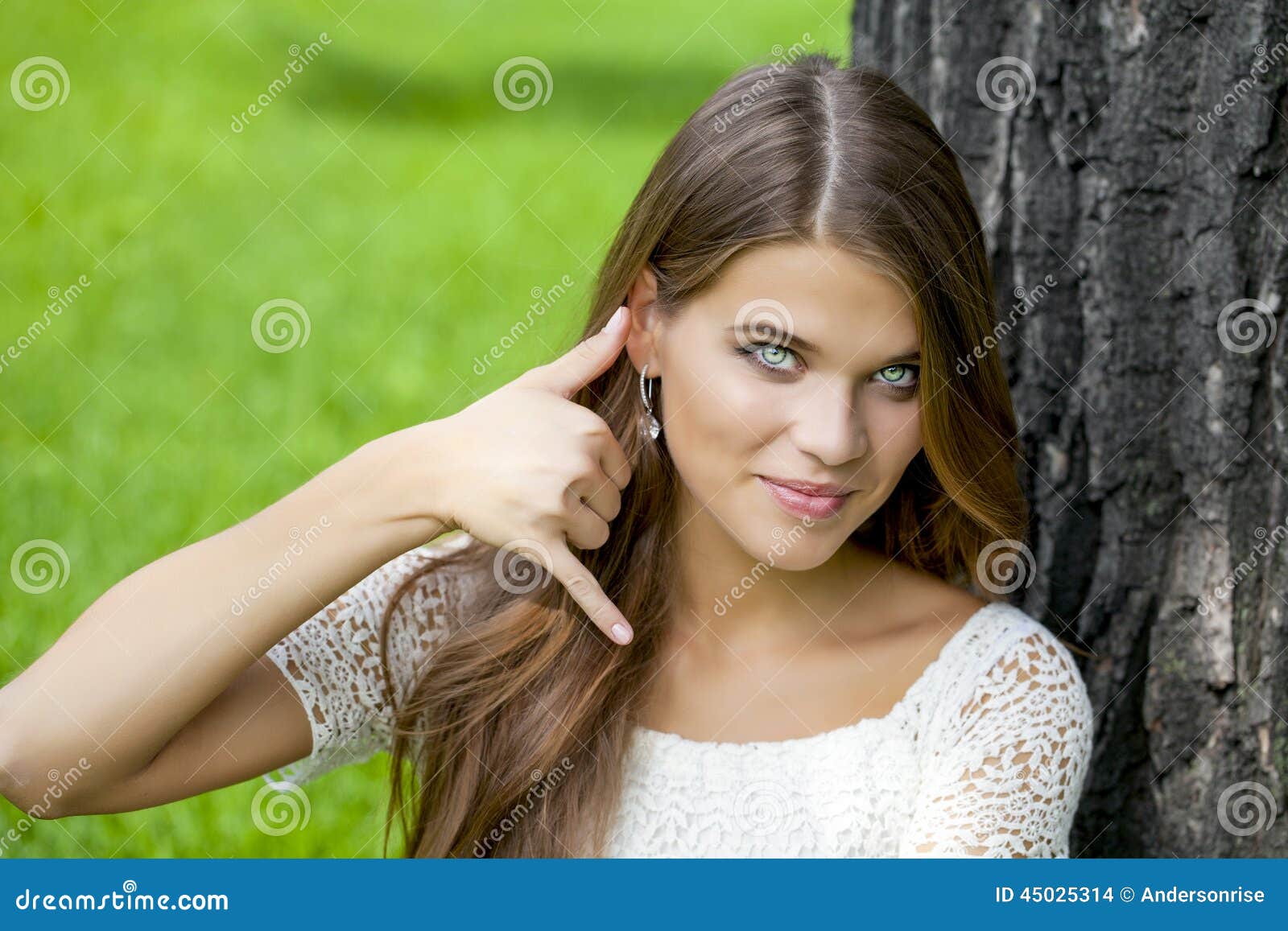 Woman Making a Call Me Gesture Stock Photo - Image of face, casual ...