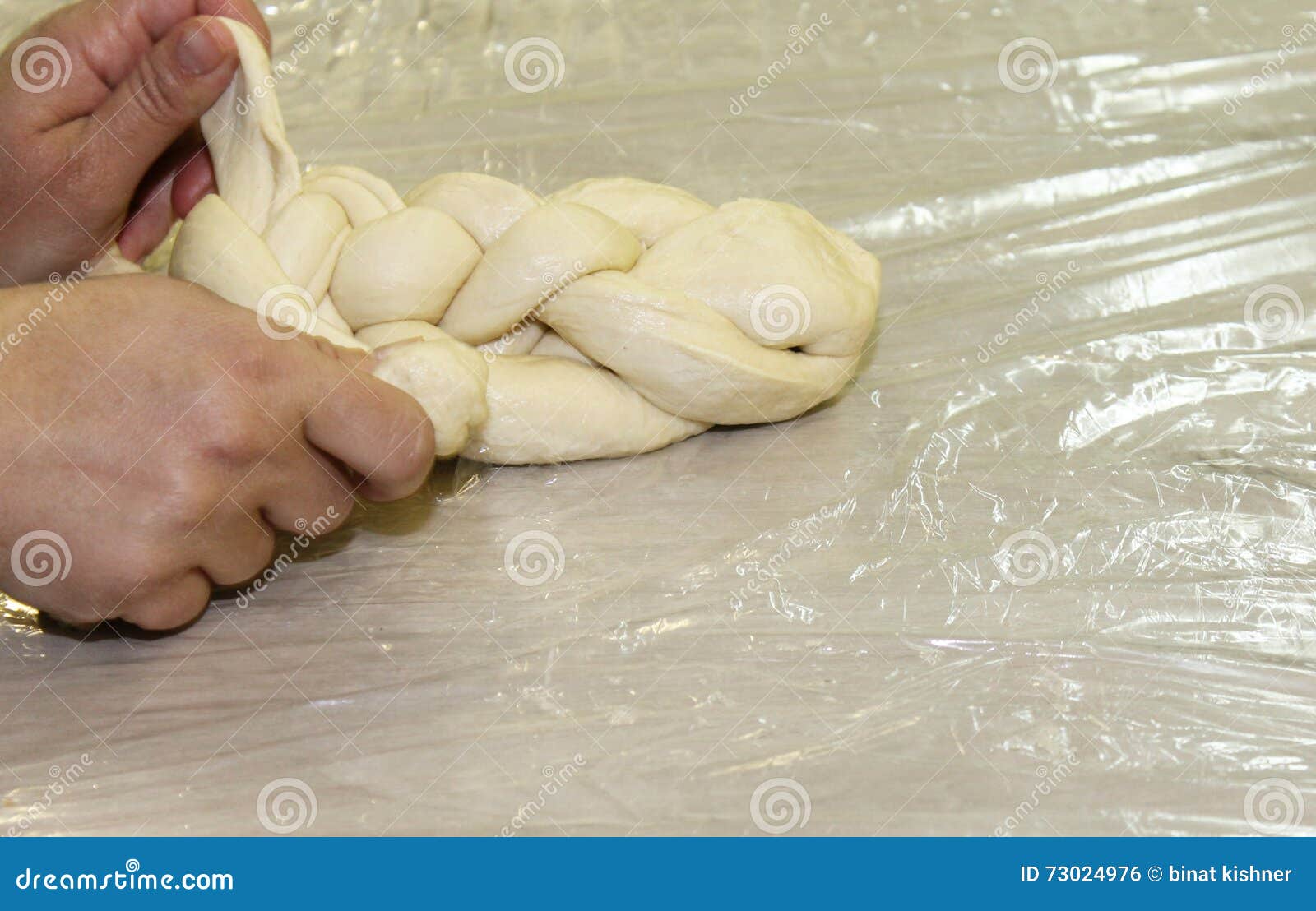 Woman making a challa stock photo. Image of loaf, hashanah - 73024976