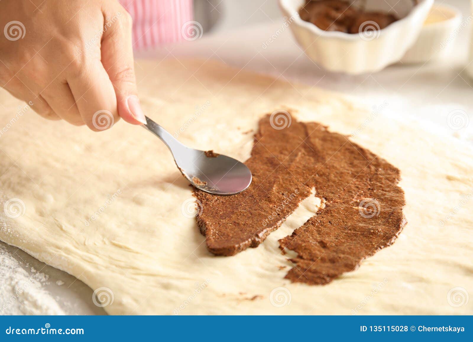 Woman Making Cinnamon Rolls at Table Stock Photo - Image of dough ...