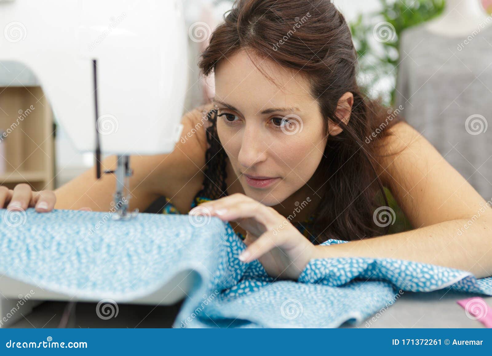 Woman Making Clothes Using Sewing Machine at Home Stock Image - Image ...
