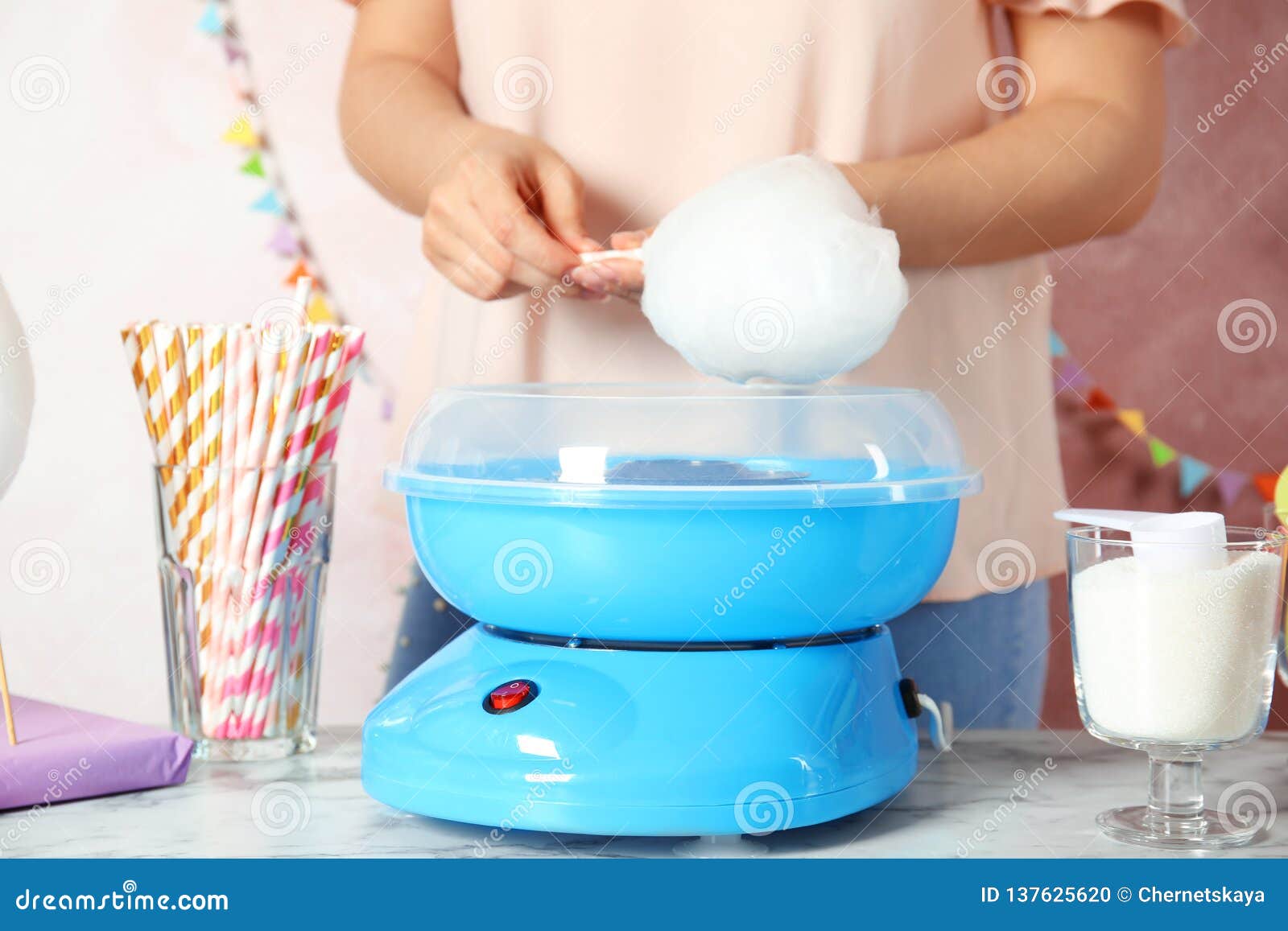 Woman Making Cotton Candy Using Modern Machine at Table Stock Photo ...