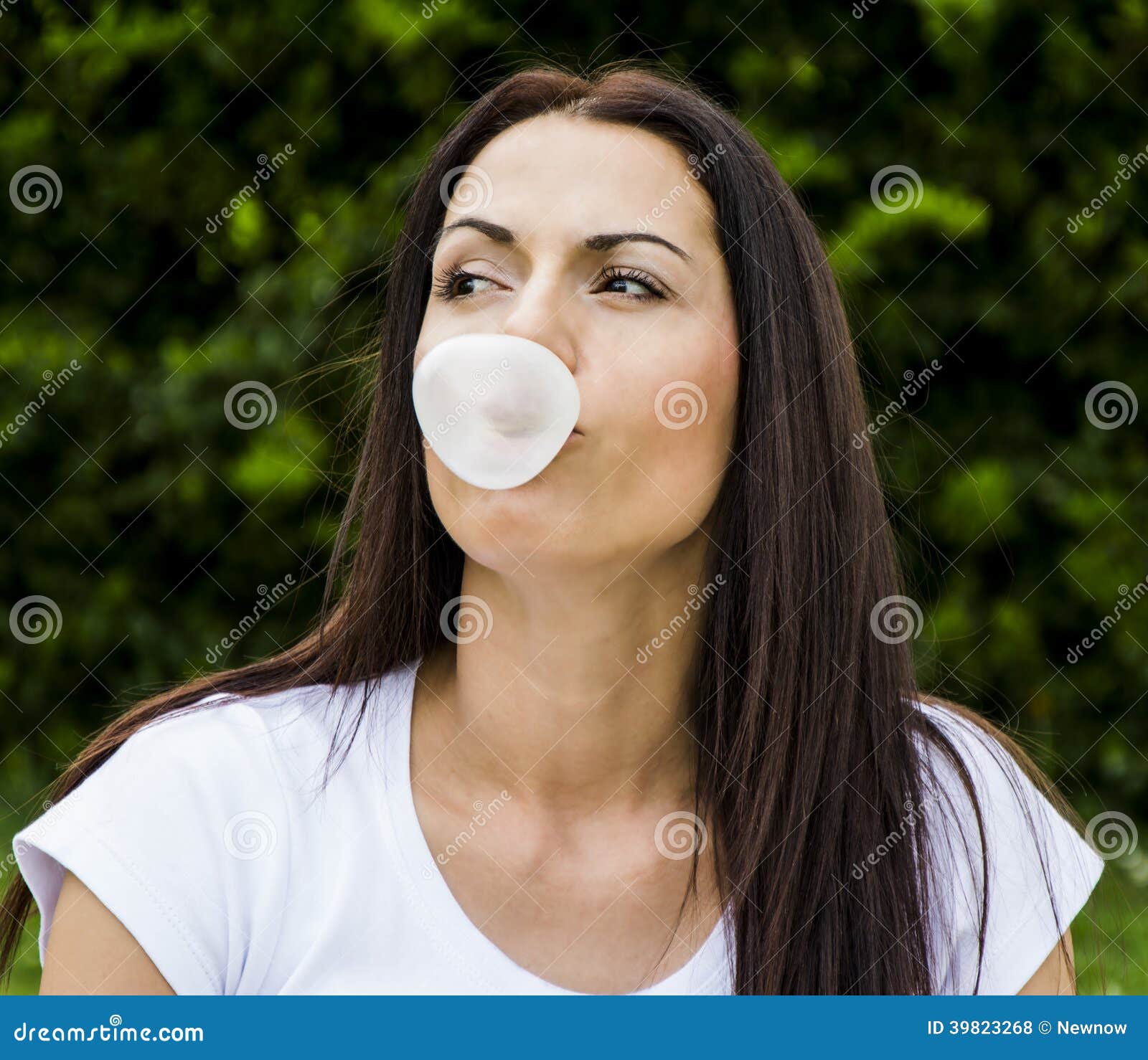 Woman making gum bubbles stock photo. Image of casual - 39823268