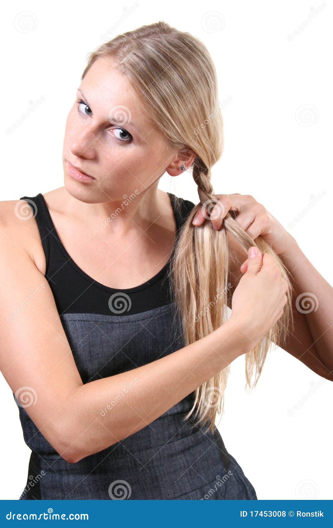 Woman making her hairstyle stock photo. Image of makeup - 17453008