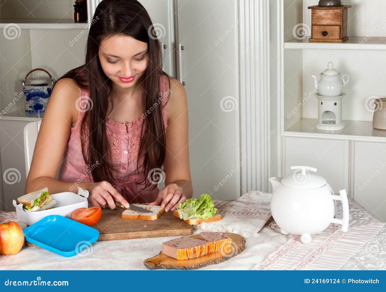 Woman making a lunchbox stock photo. Image of fruit, morning - 24169124