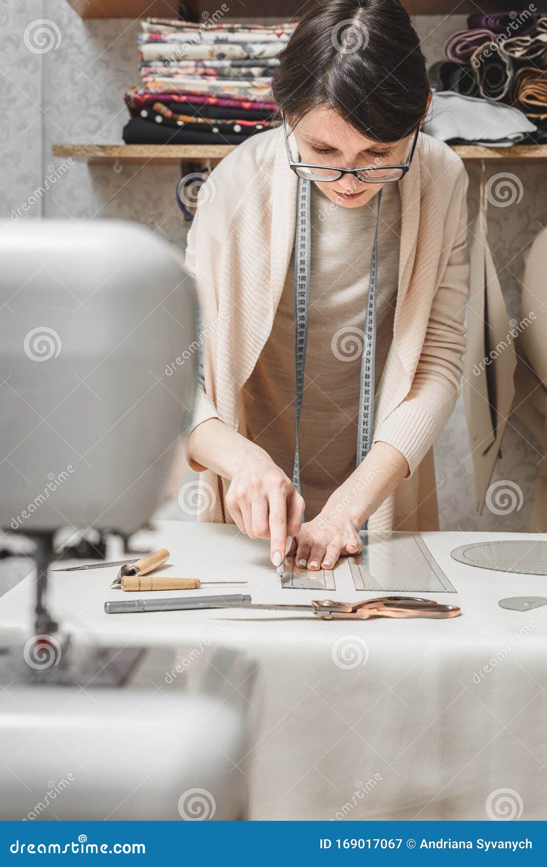 Woman Making Measurements in Patterns in Workshop Stock Image - Image ...