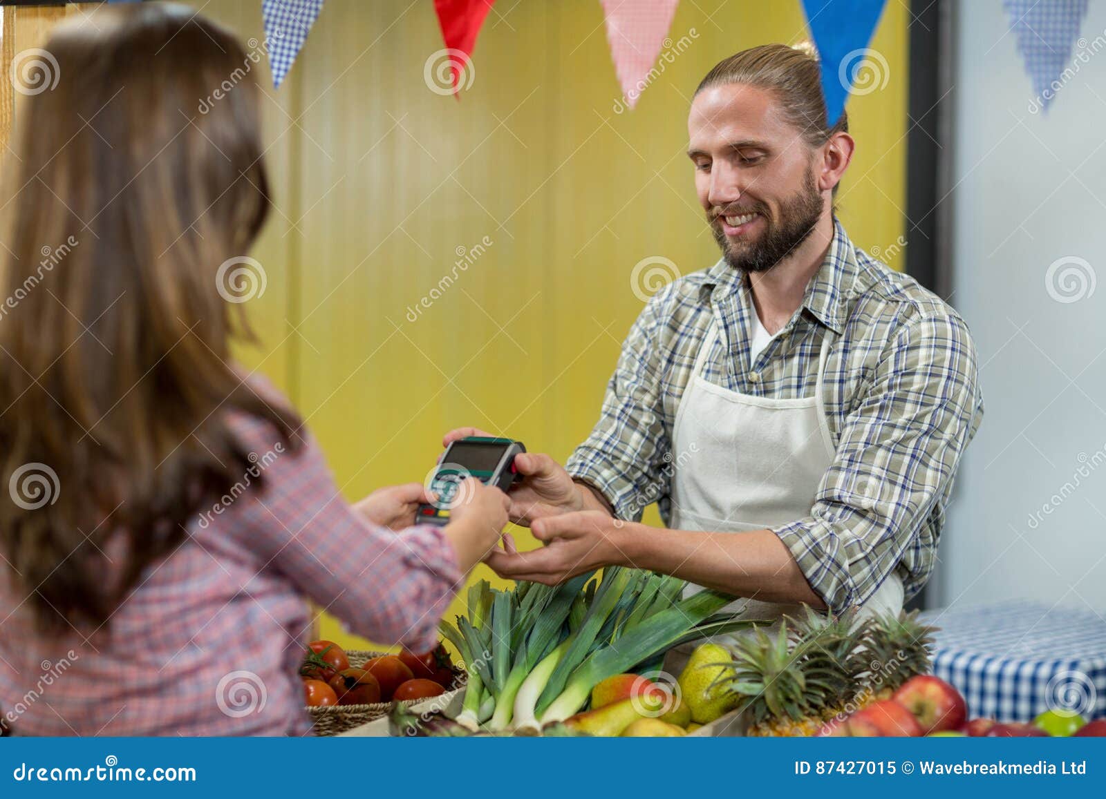 Woman Making a Payment at the Counter Stock Image - Image of ...