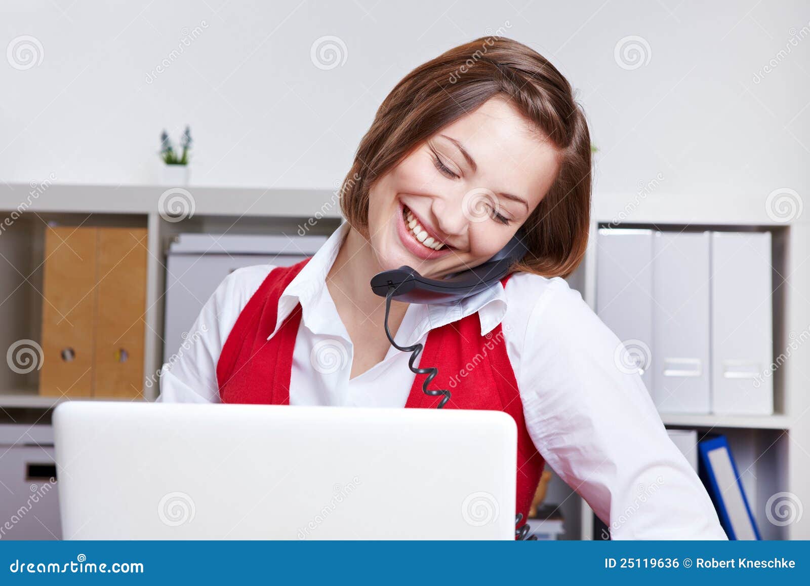Woman making a phone call stock photo. Image of office - 25119636