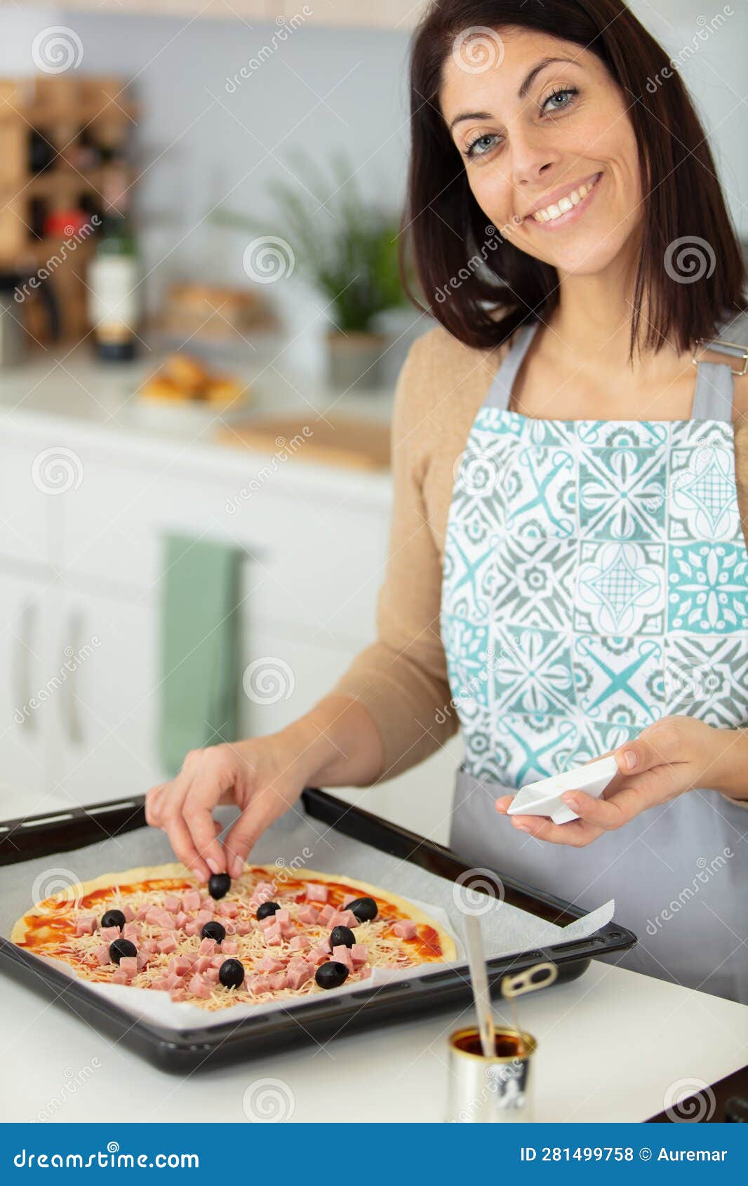 Woman Making Pizza Adding Olive Toppings Stock Photo - Image of home ...