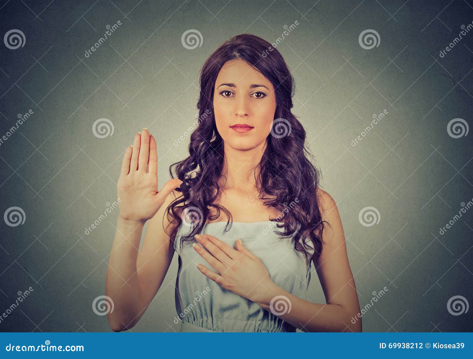 Woman making a promise stock photo. Image of latin, expression - 69938212
