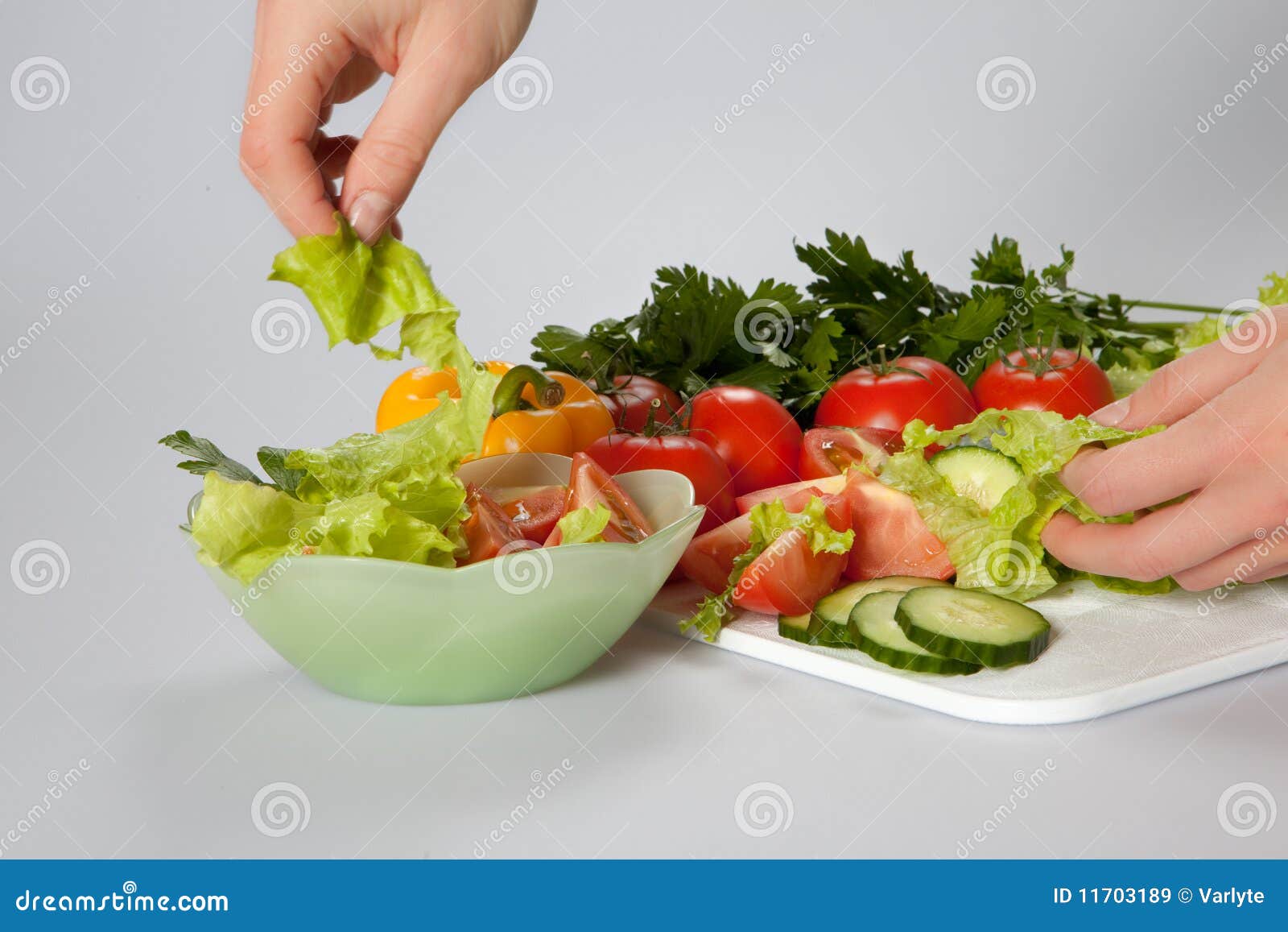 Woman making salad 3 stock image. Image of tomato, table - 11703189